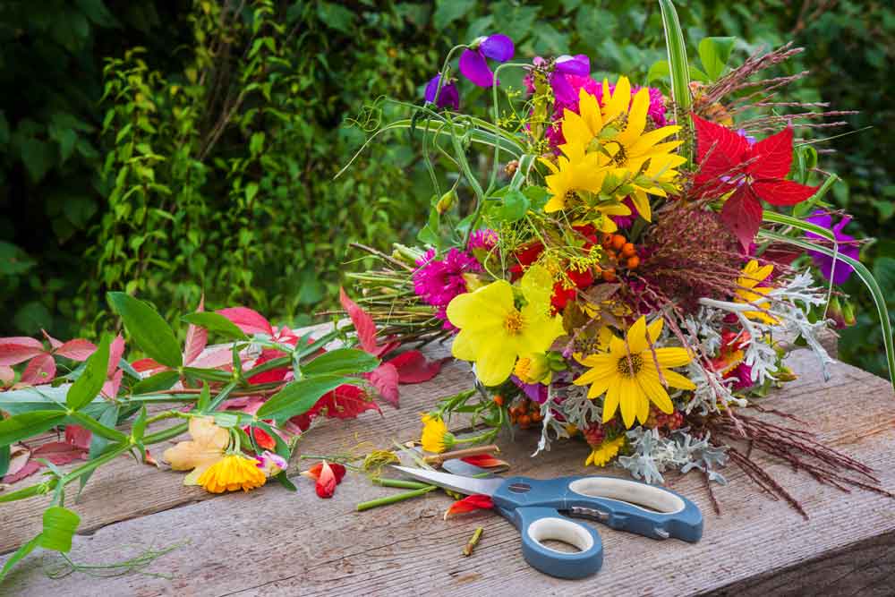 Fall Greens With Fresh Flowers